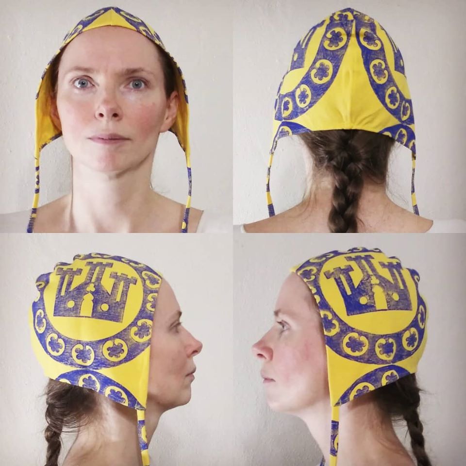 Small cotton coif/arming cap in yellow/blue with 13th century castle ...