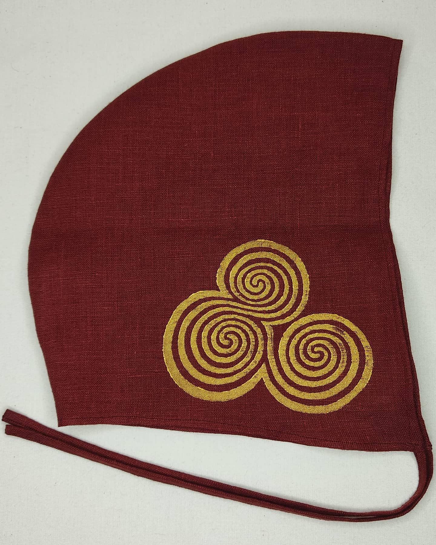 Large linen coif/arming cap in red (dark)/gold with Newgrange triple ...