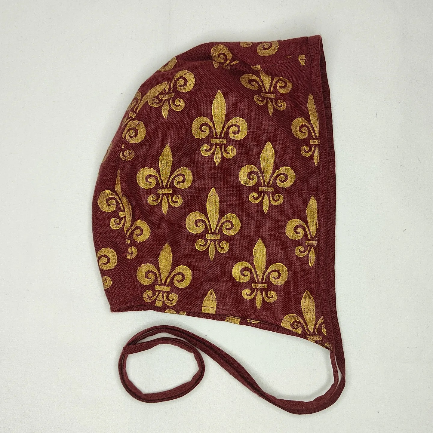 Small linen coif/arming cap in red (dark)/gold with fleur-de-lis print ...